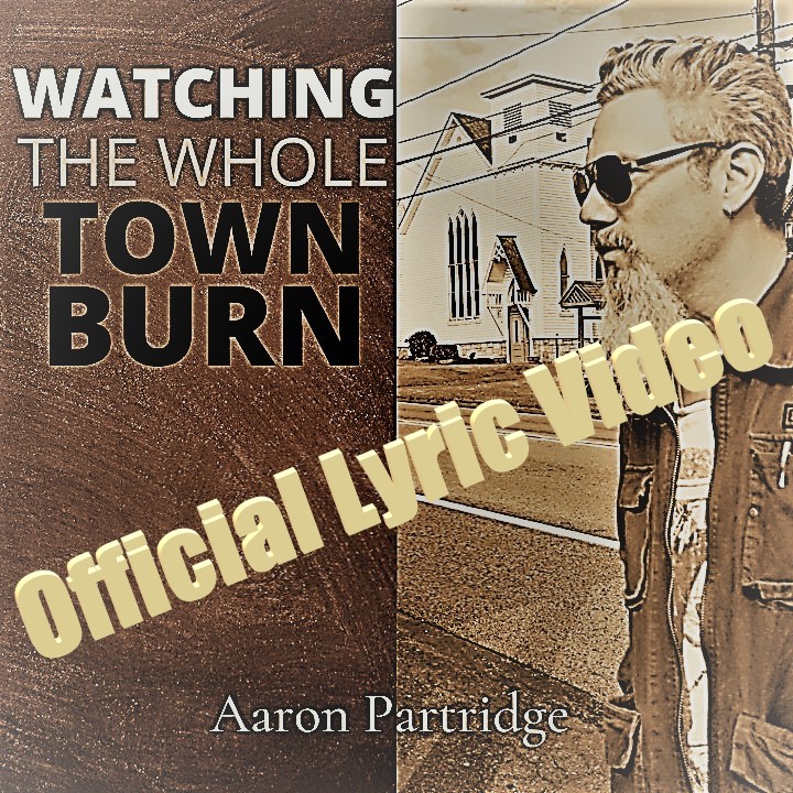 Watching The Whole Town Burn – The Real Aaron Partridge